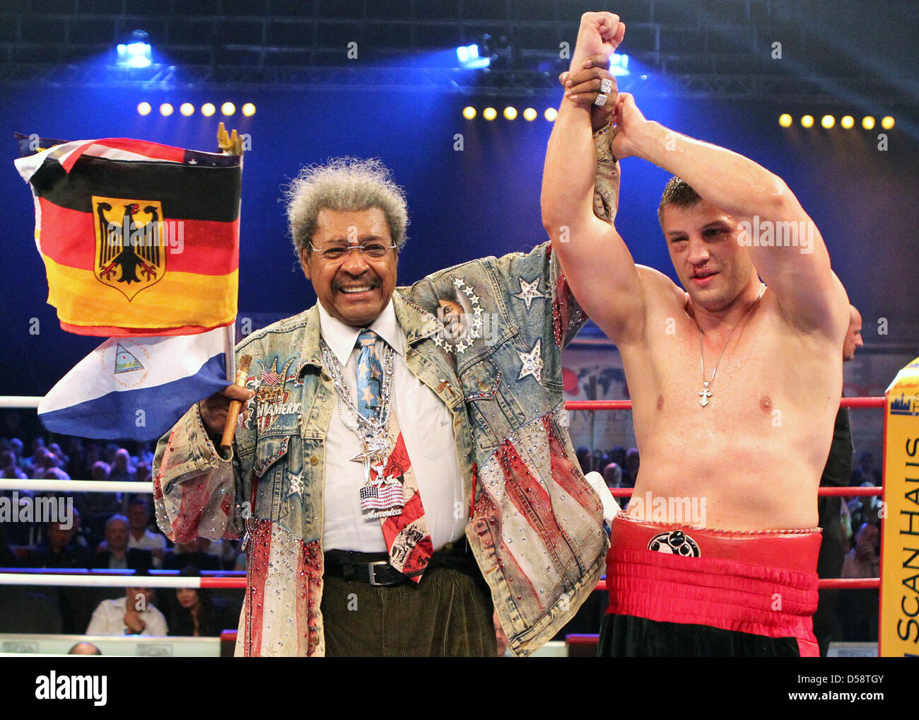 Belarusian boxer Sergey Liakhovich (R) celebrates his victory at the ...