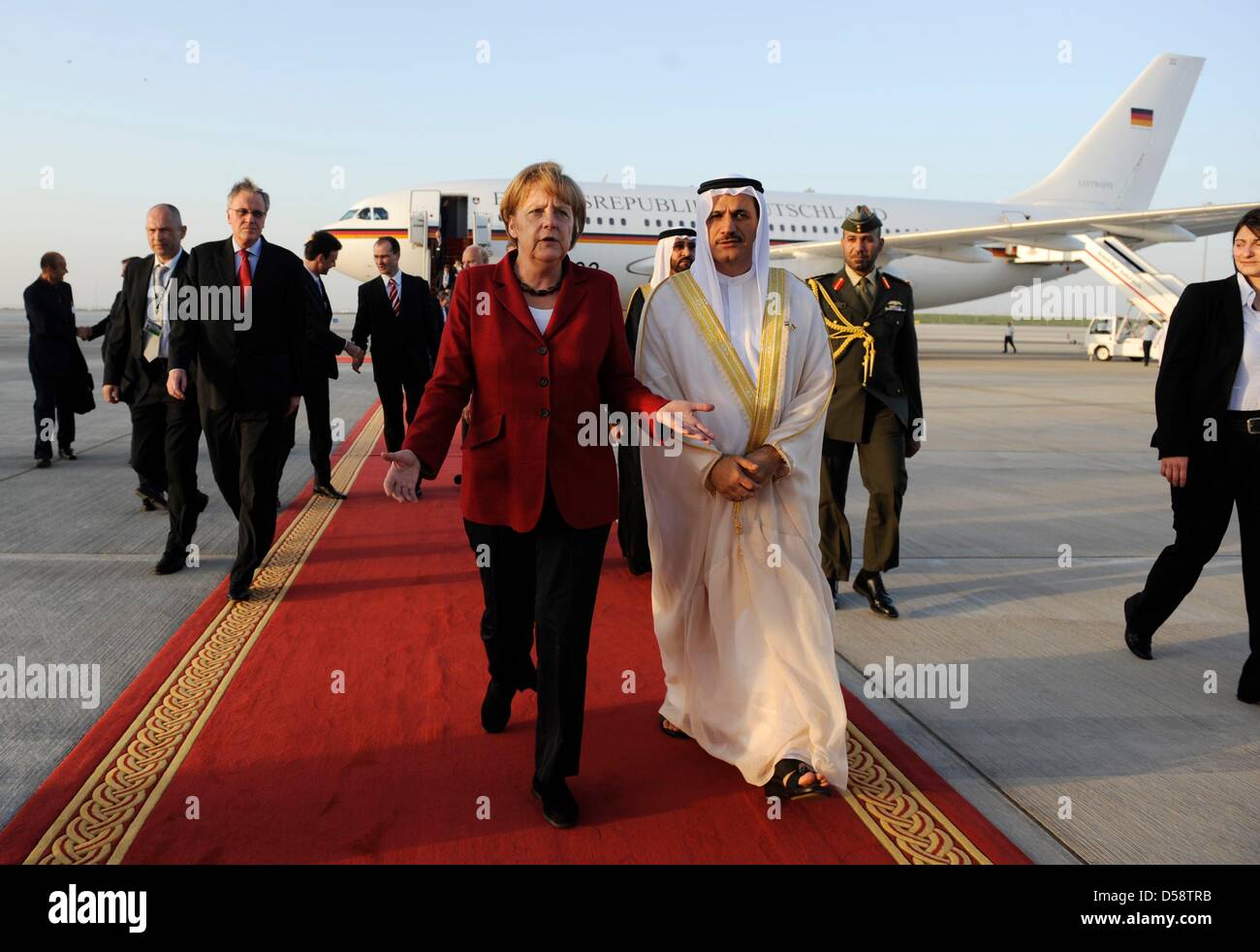 UAE Economy Minister Sultan bin Saeed Mansouri (R) receives German ...