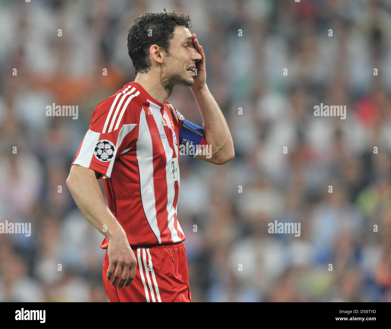 Bayern's Mark van Bommel is disappointed after the UEFA Champions ...