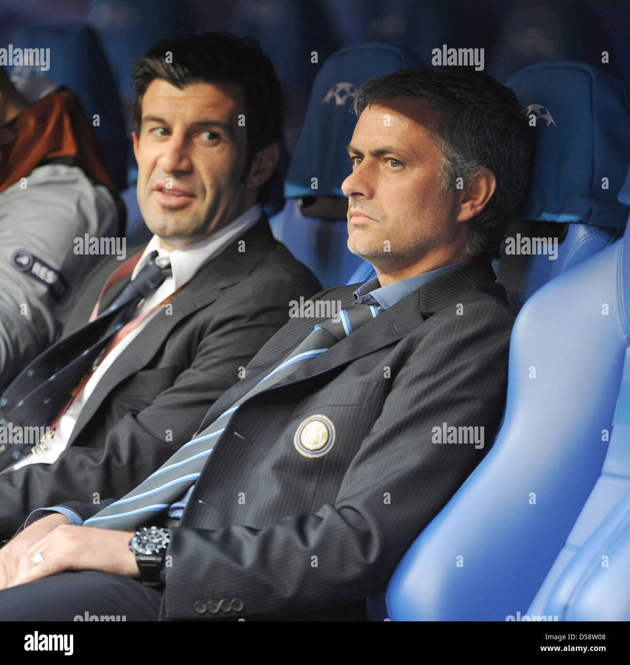 Inter's head coach Jose Mourinho (R) and former Inter player Luis Figo ...