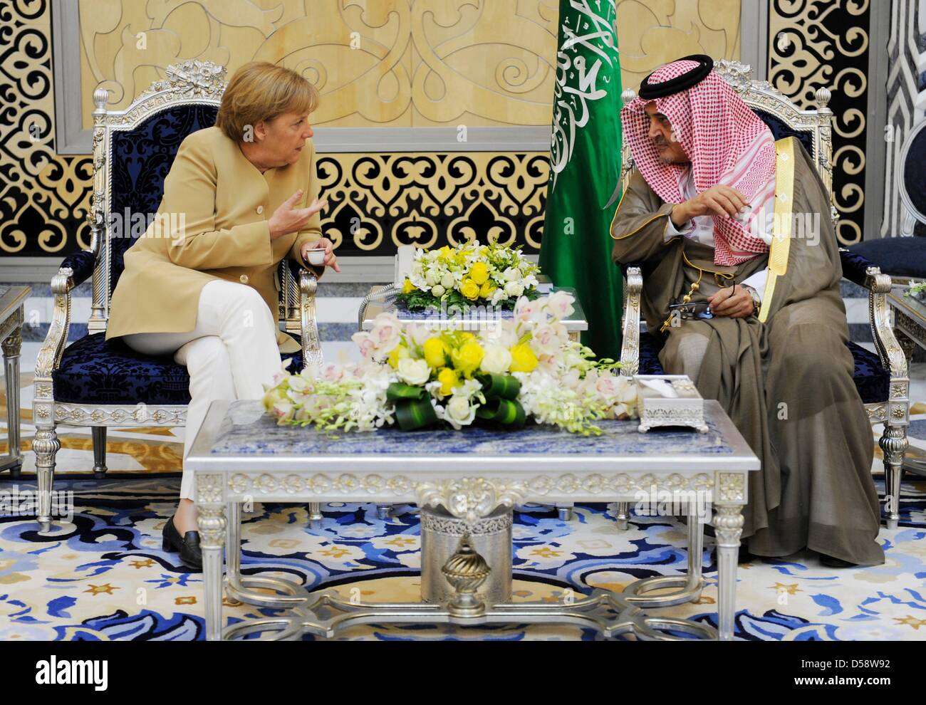 German Chancellor Angela Merkel talks with Saudi Arabia's Foreign ...