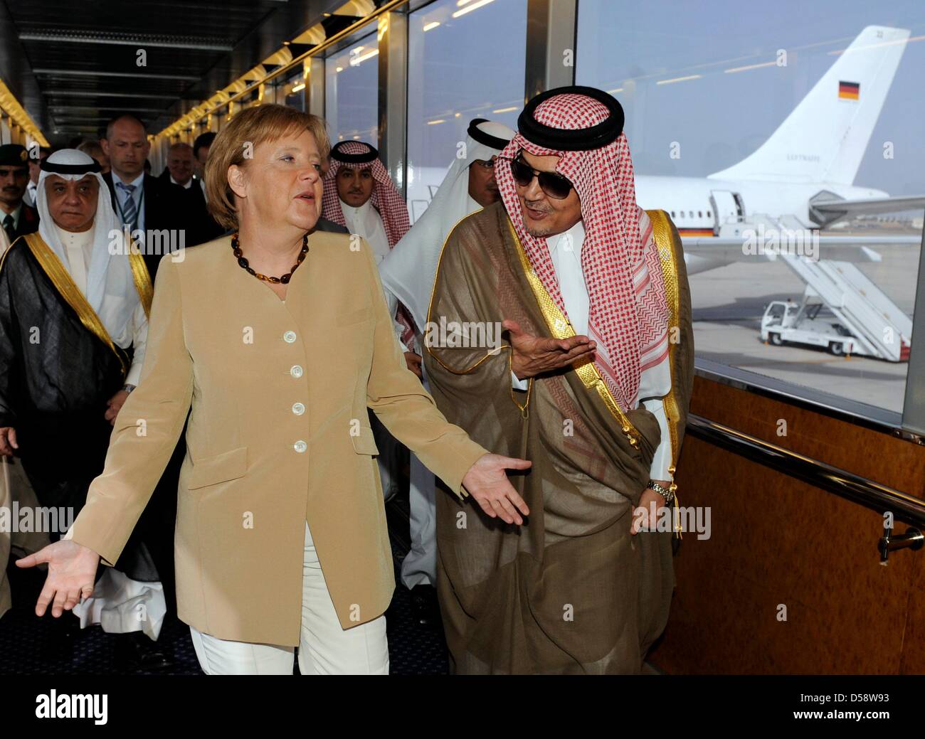 German Chancellor Angela Merkel is welcomed by Saudi Arabia's Foreign ...