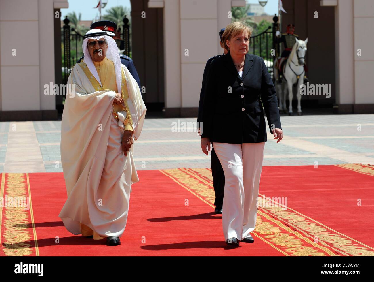 Bahrain's Prime Minister Khalifa ibn Sulman al Khalifa (L) welcomes ...
