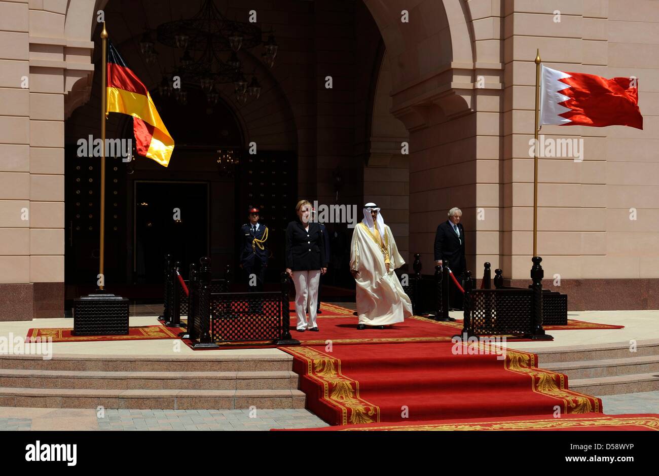 Bahrain's Prime Minister Khalifa ibn Sulman al Khalifa (R) welcomes ...