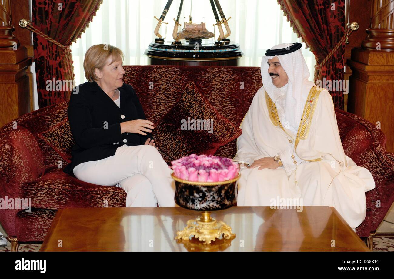 Bahrain's Prime Minister Khalifa ibn Sulman al Khalifa (R) welcomes ...