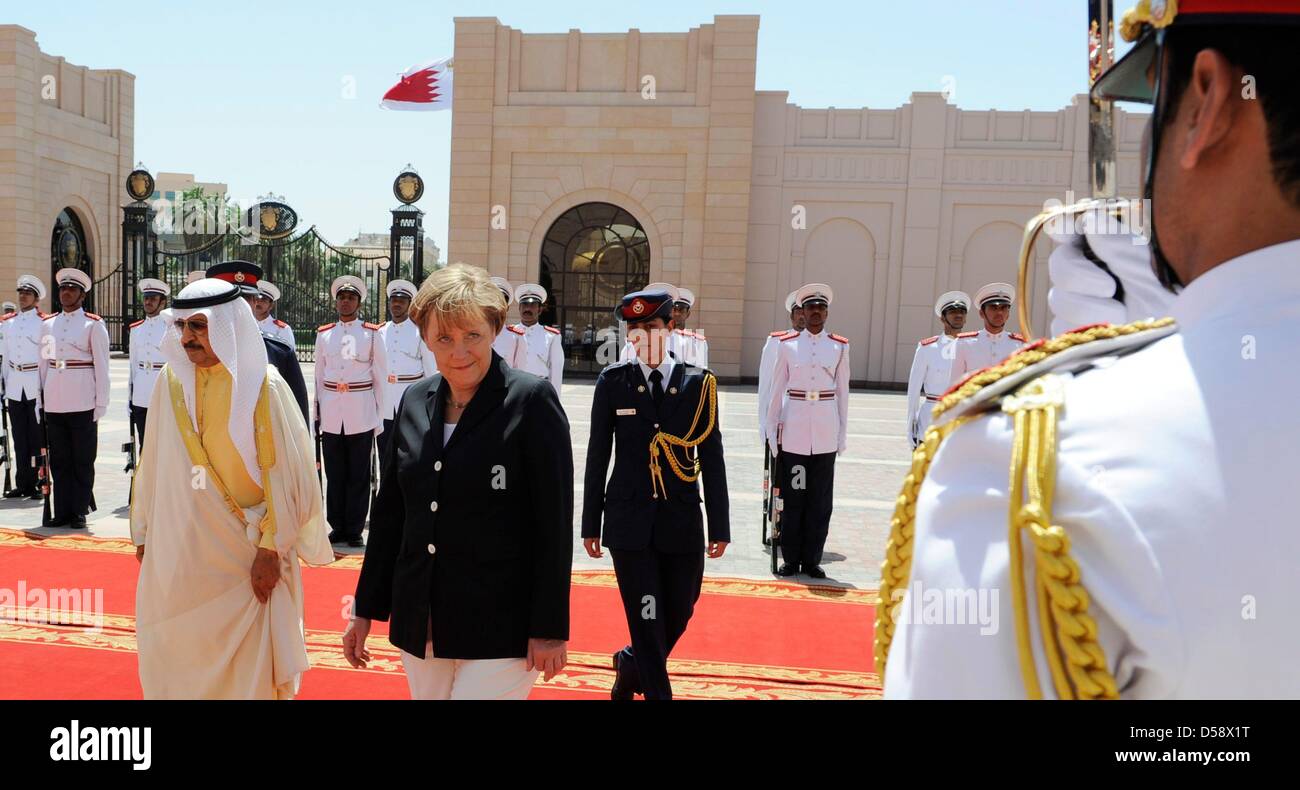 Bahrain's Prime Minister Khalifa ibn Sulman al Khalifa (L) welcomes ...