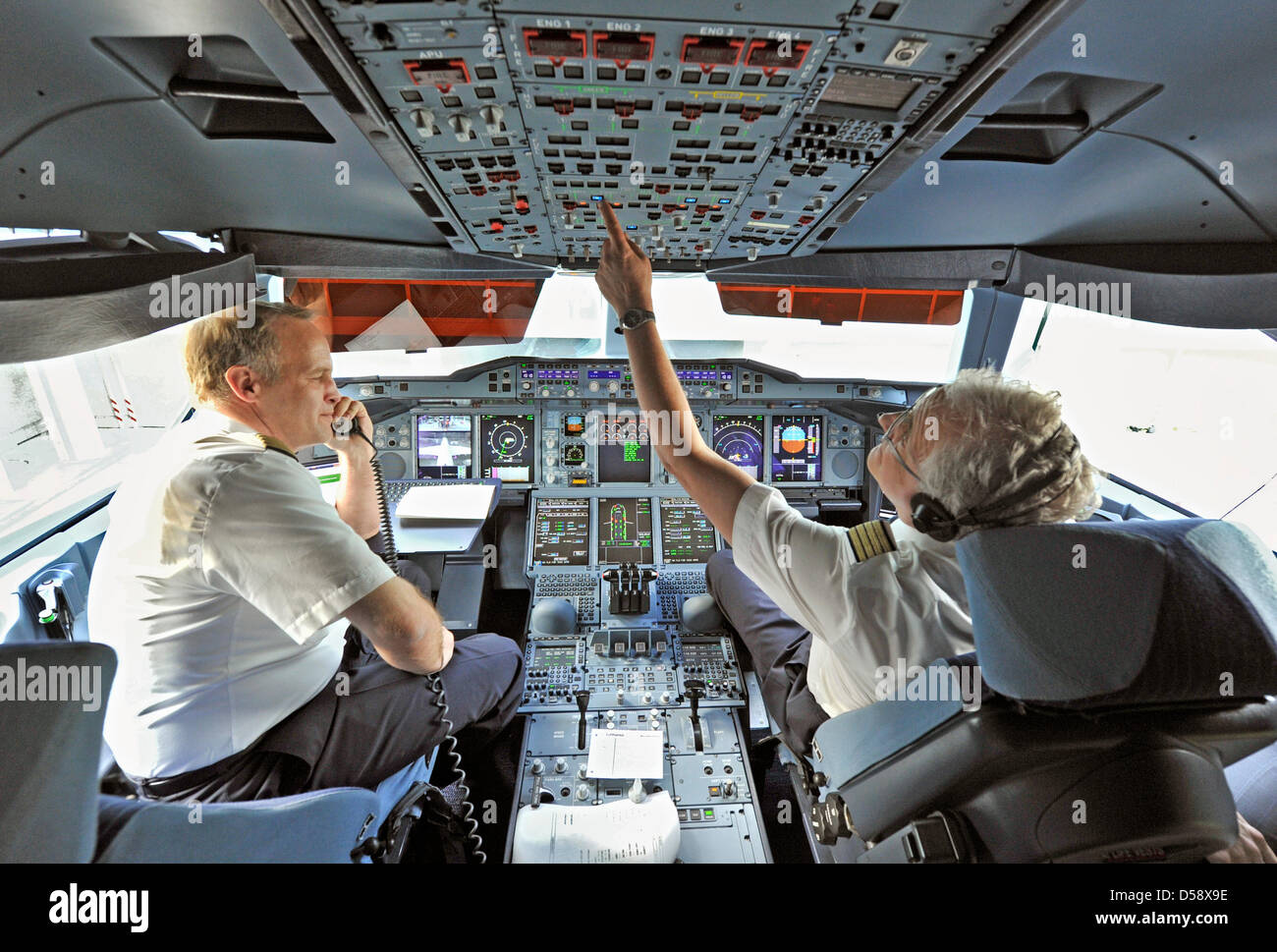 Exactly as prior to a real start, the pilots check the instruments in ...
