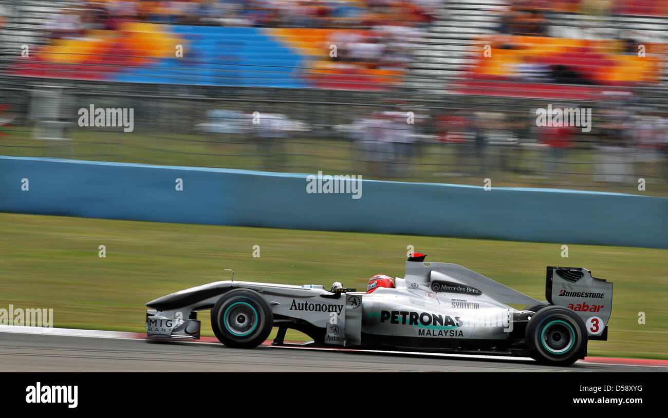 German Formula One driver Michael Schumacher of Mercedes GP steers his ...