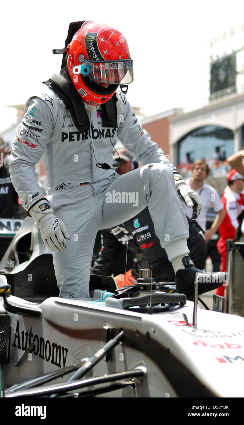 German Michael Schumacher of Mercedes GP in the starting line up ahead ...
