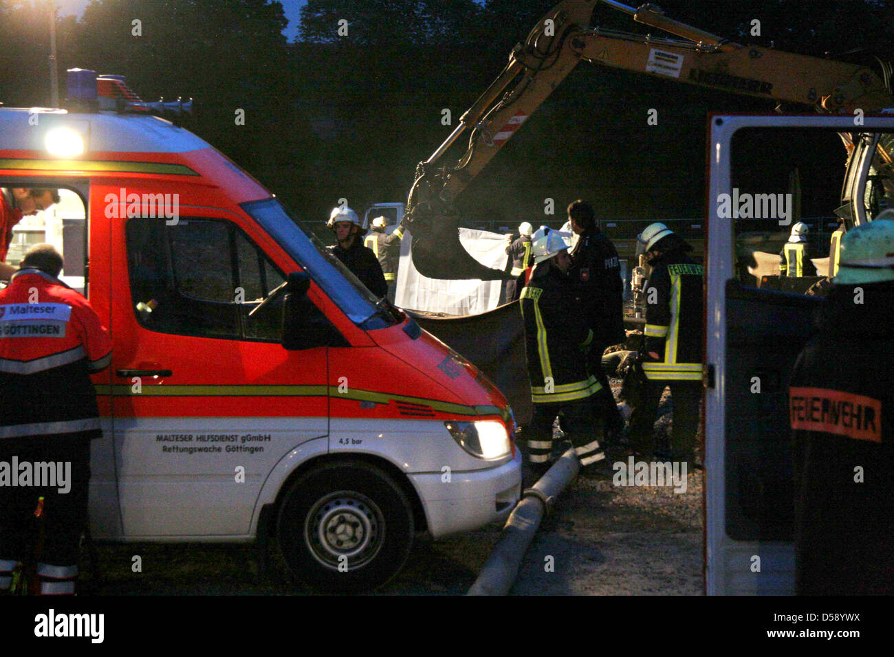 Firemen and paramedics pictured at the explosion site of a failed bomb ...