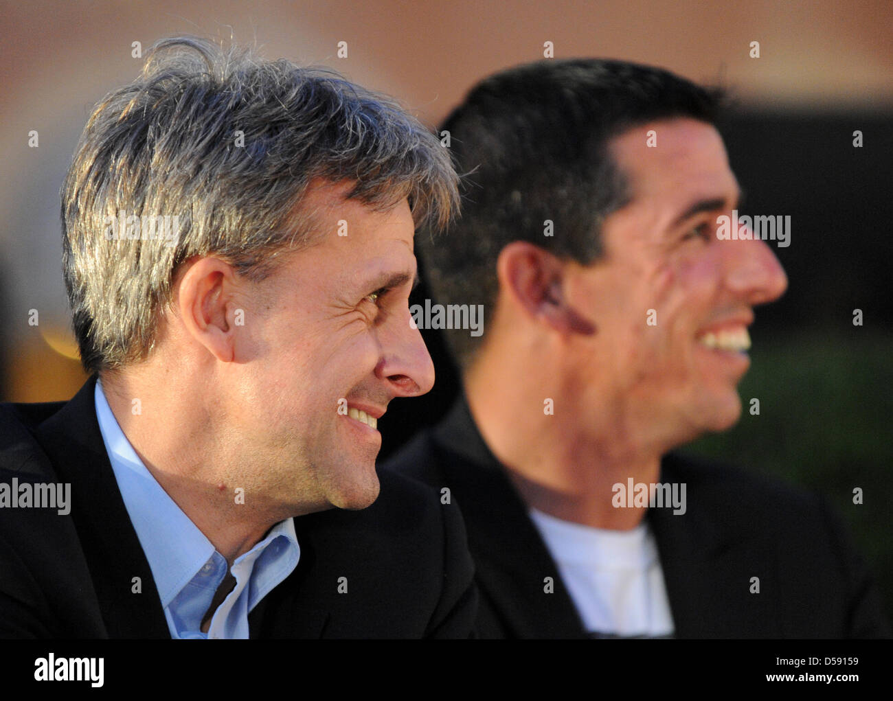 Soccer legends Pierre Littbarski (L) and Roy Makaay (R) judge a total ...