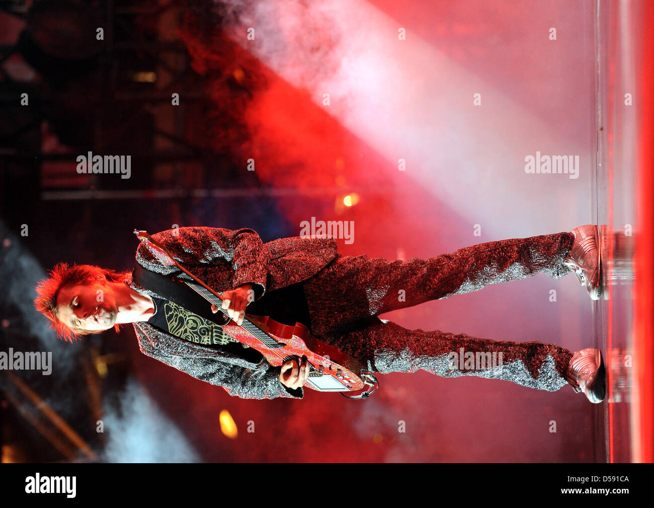 British stadium rock band Muse performs with lead singer Matthew ...