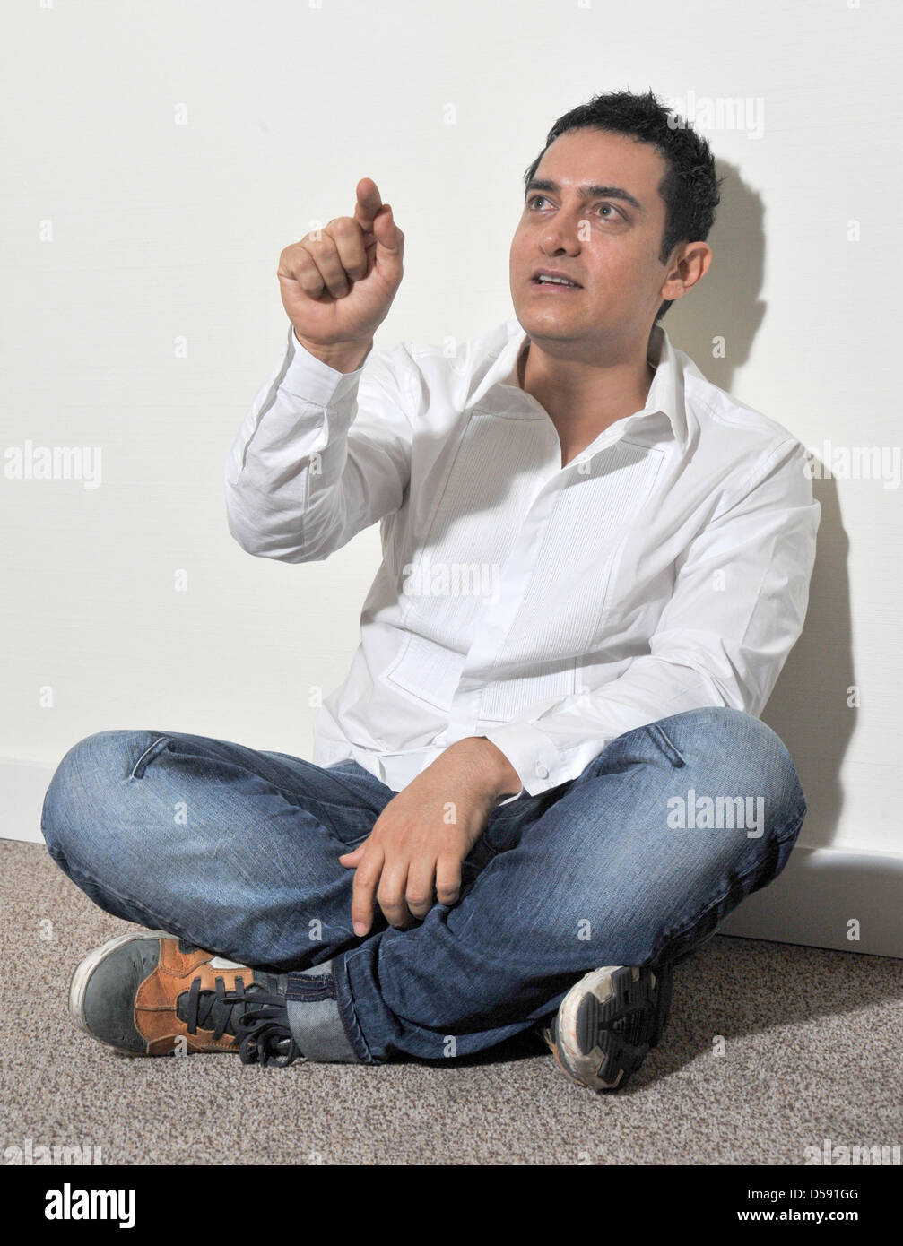 Indian actor and director Aamir Khan smiles during a photo opportunity ...