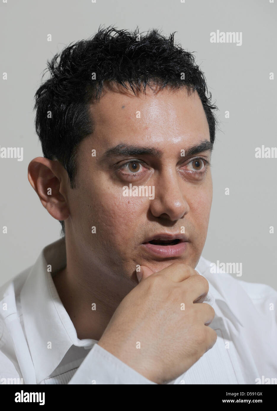 Indian actor and director Aamir Khan smiles during a photo opportunity ...