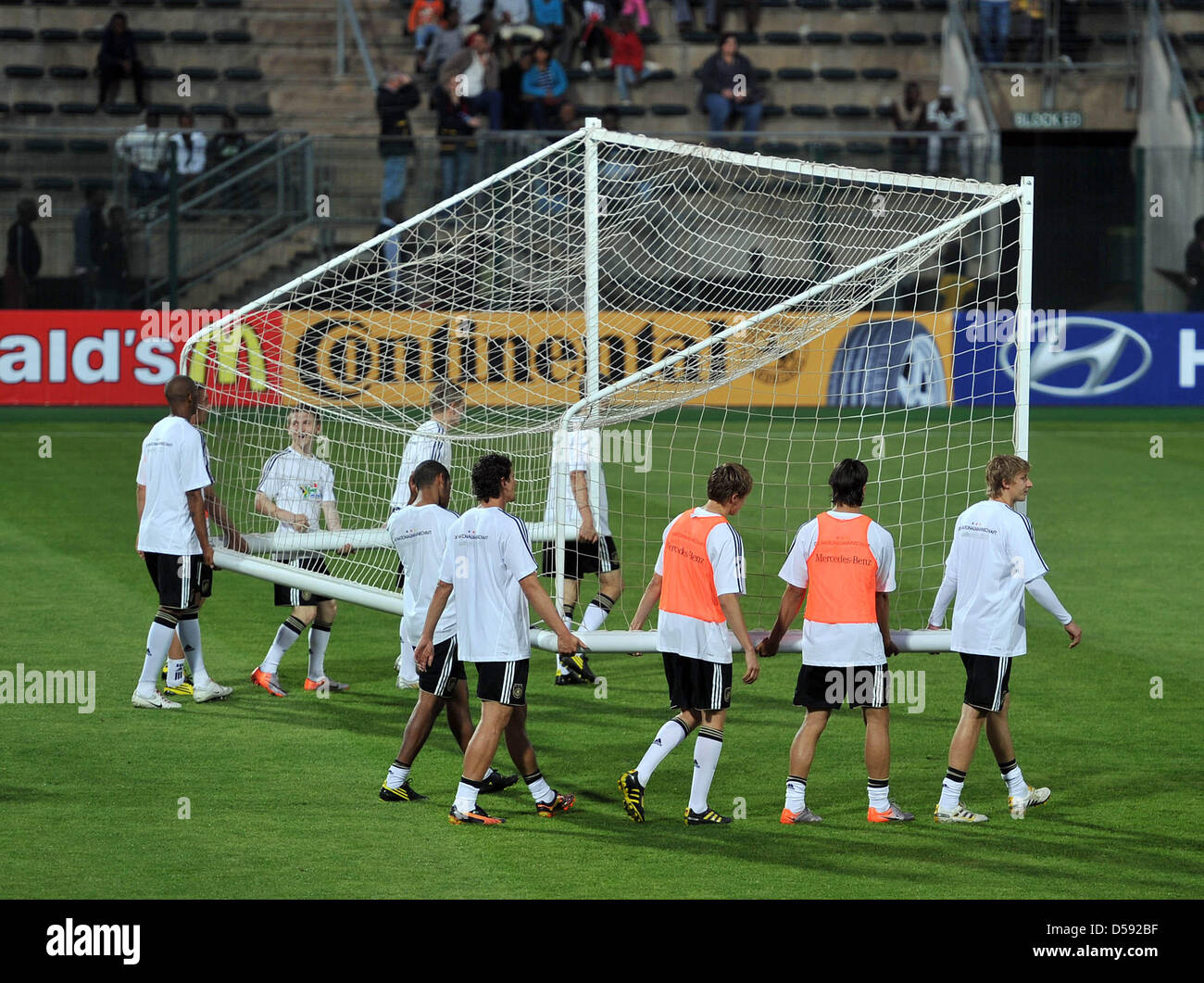 German players carry a goal during a training session of the German ...