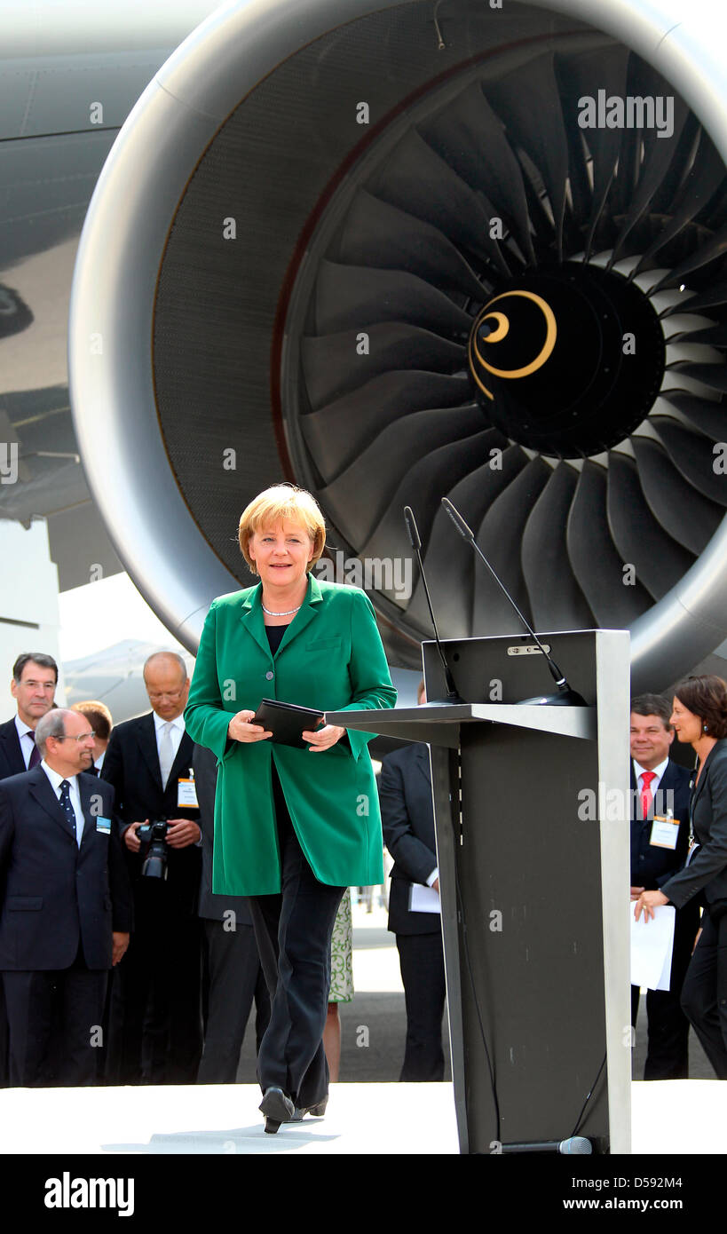 In front of a huge power plant of an Airbus A380-800 of Lufthansa ...