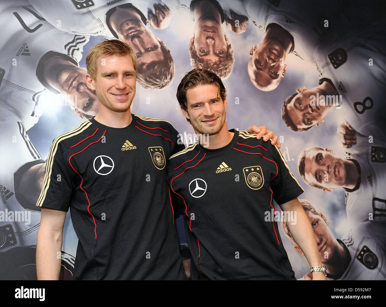 German players Per Mertesacker (L) and Arne Friedrich stand together ...