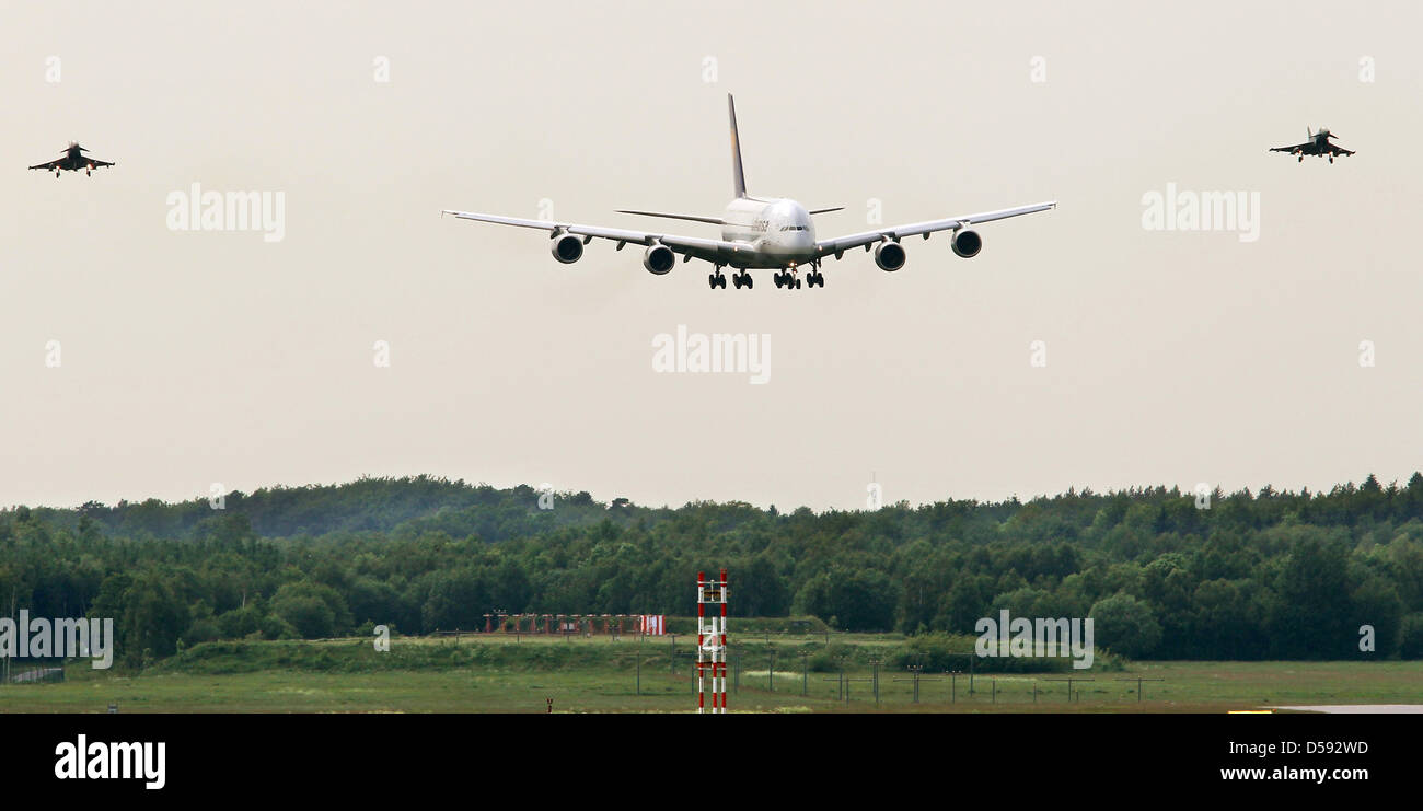 An Airbus A380 of German airline Lufthansa is accompanied by two ...