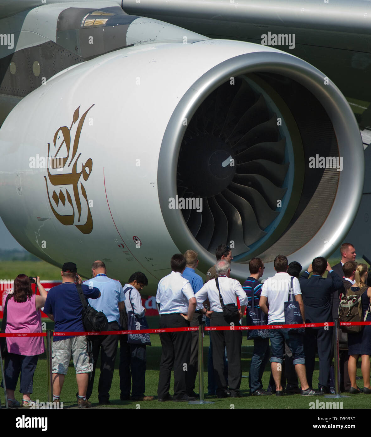 Visitors check out the engine of an Airbus A380 of airline Emirates at ...