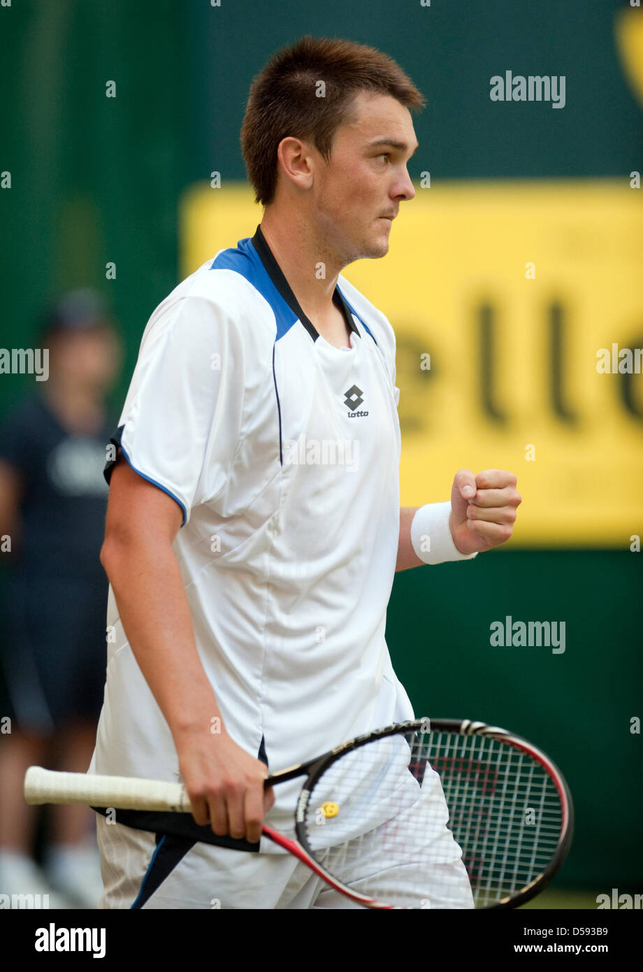 Germany's Andreas Beck celebrates winning his during their Gerry Weber ...