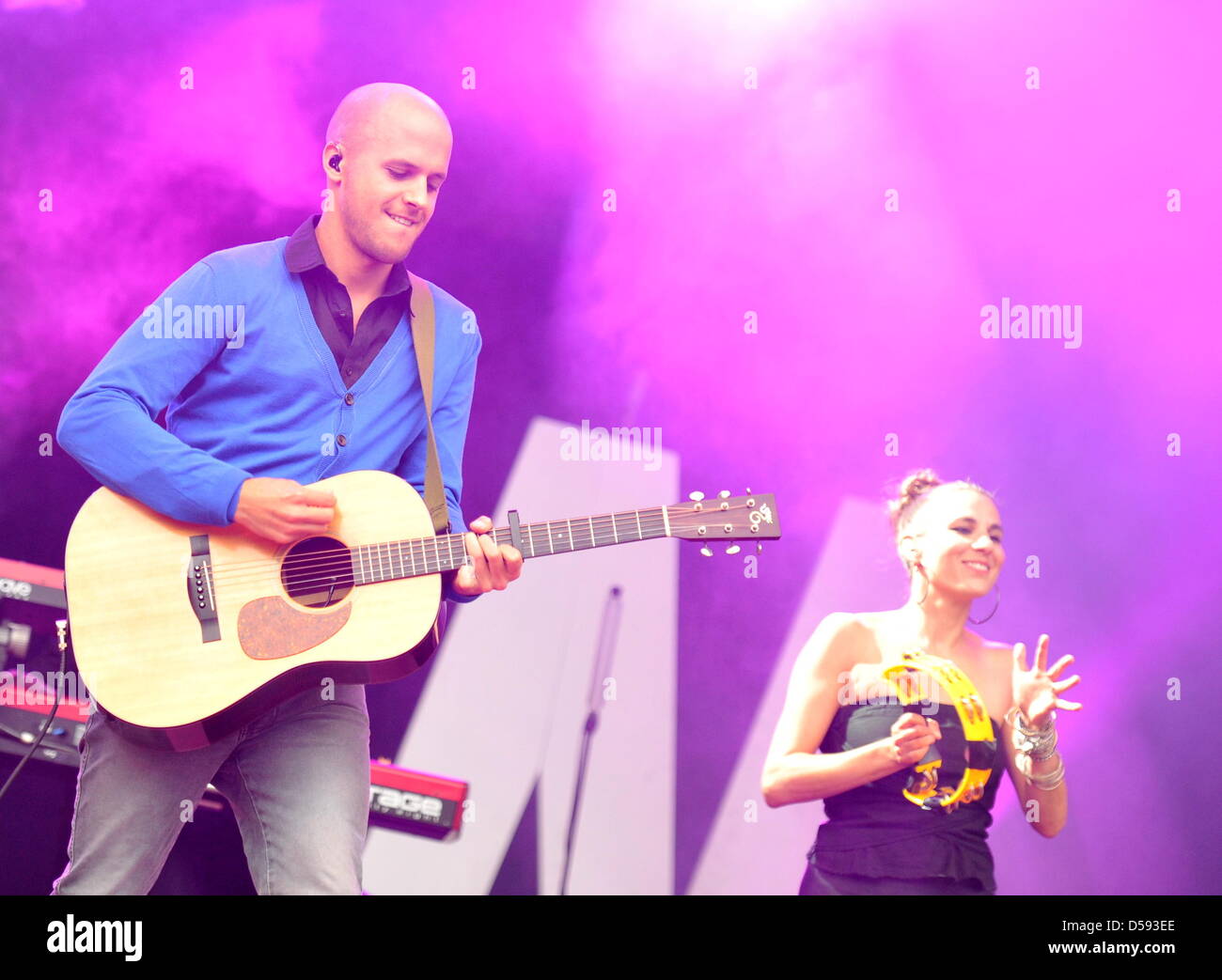 Belgian singer Milow (L) perfoms during a concert at the Stadtpark ...
