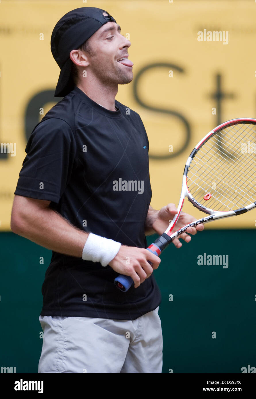 Germany's Benjamin Becker grimaces to Russia's Davidenko during their ...