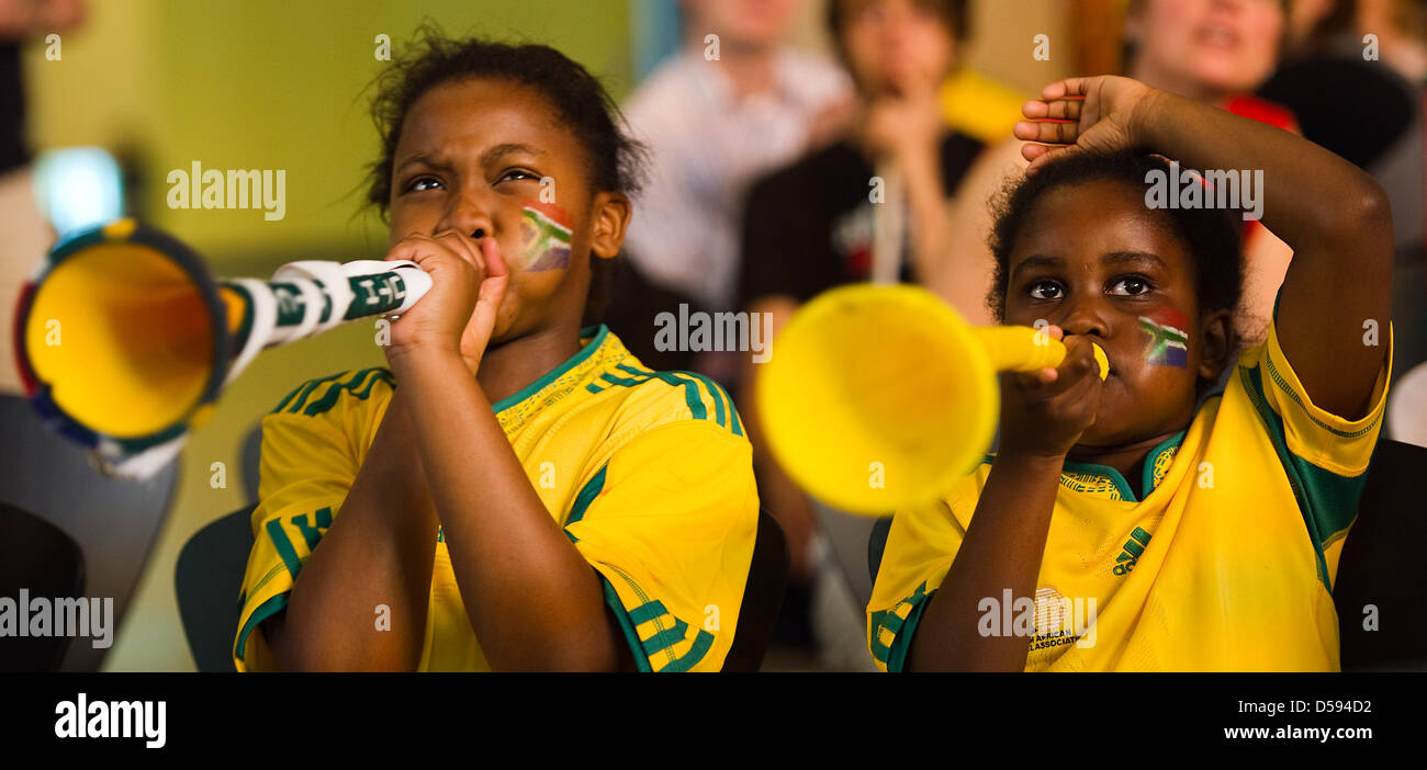 South African soccer fans follow the openeing ceremony of the FIFA ...