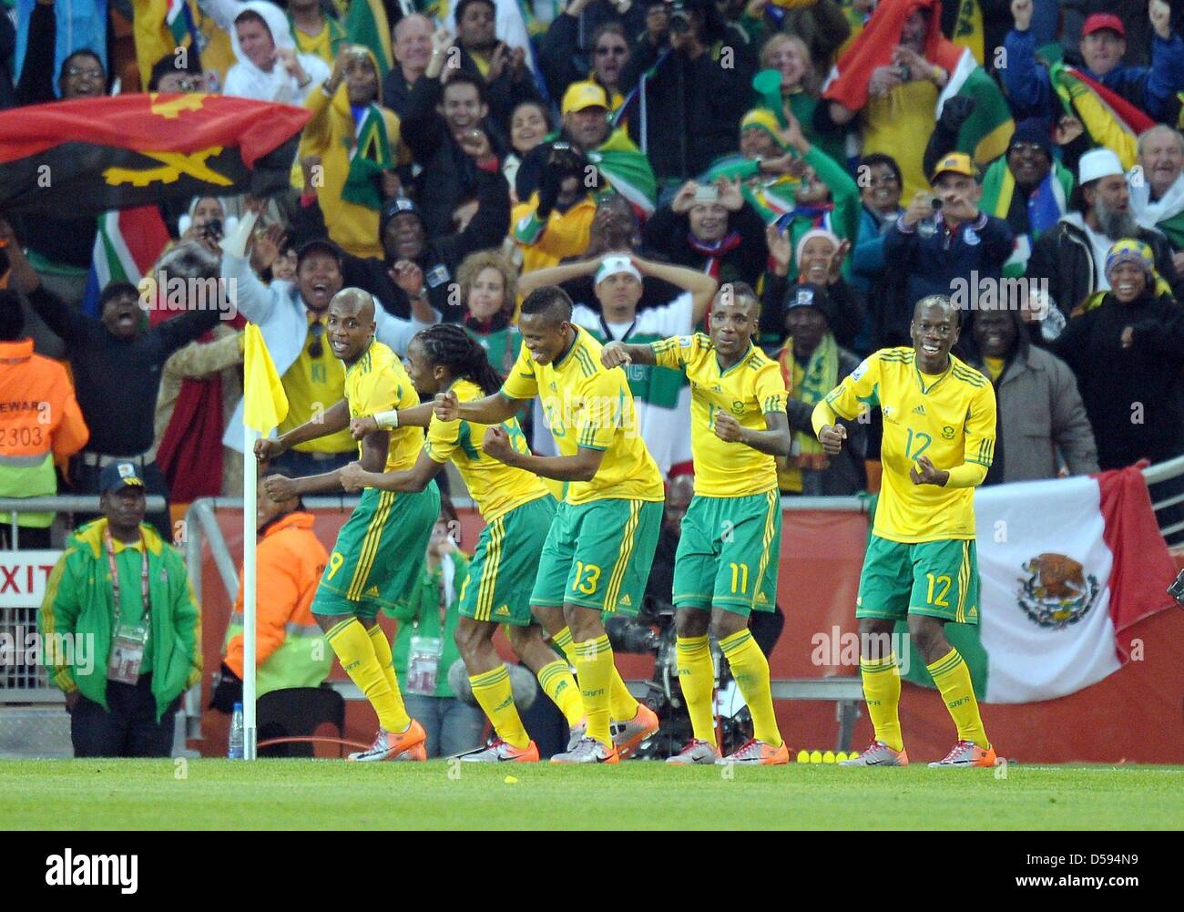 South African players celebrate after Siphiwe Tshabalala (2-L) scored ...