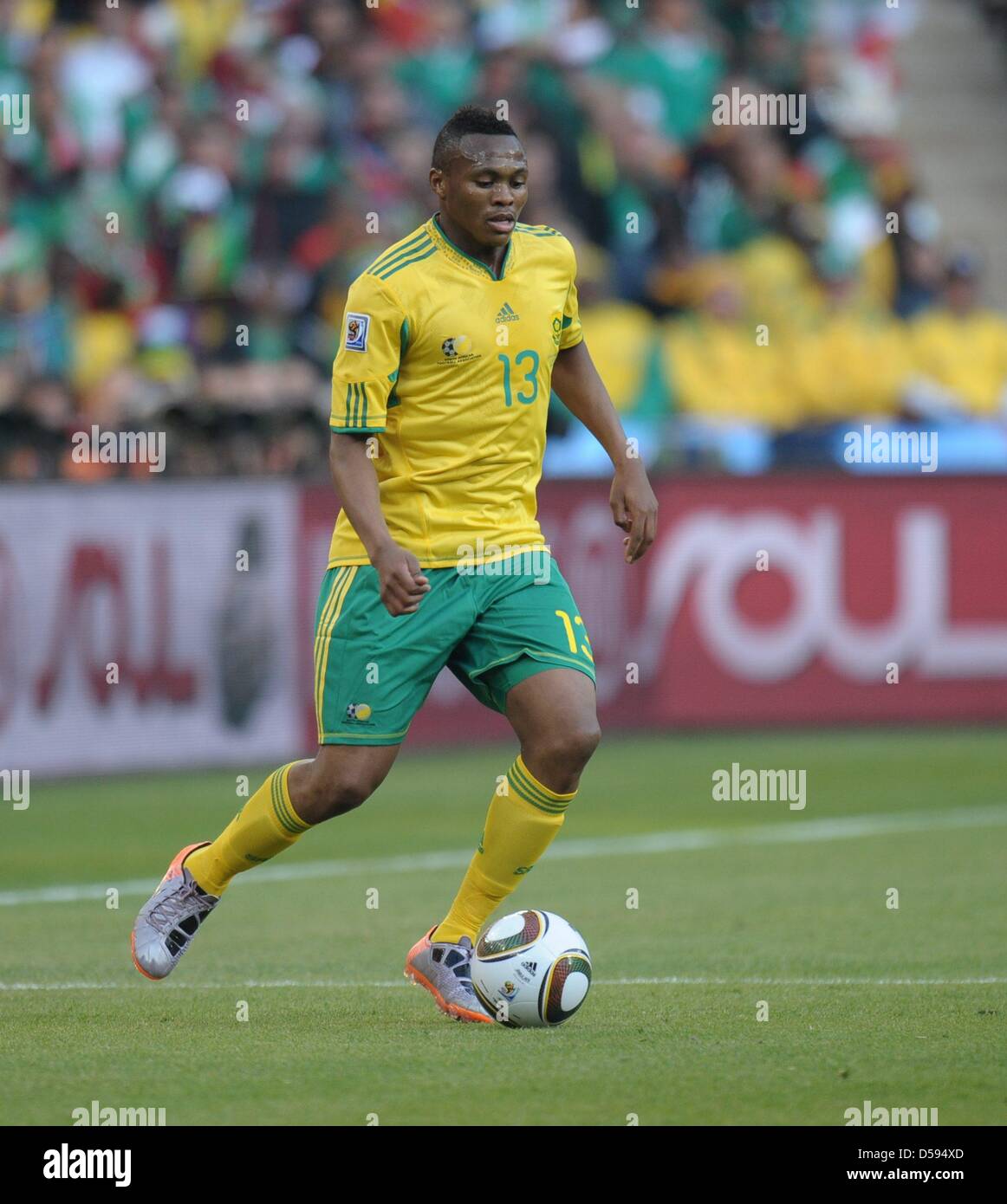 Kagisho Dikgacoi of South Africa controls the ball during the 2010 FIFA ...