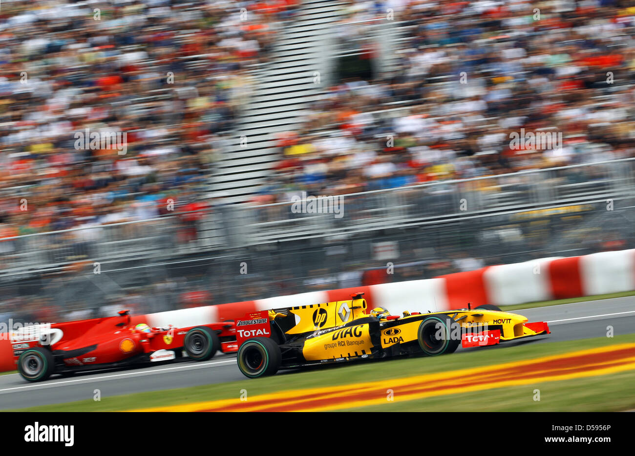 Poland's Formula One driver Robert Kubica of Renault (front) and Brazil ...