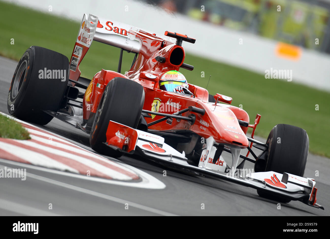 Brazil's Formula One driver Felipe Massa of Ferrari steers his race car ...