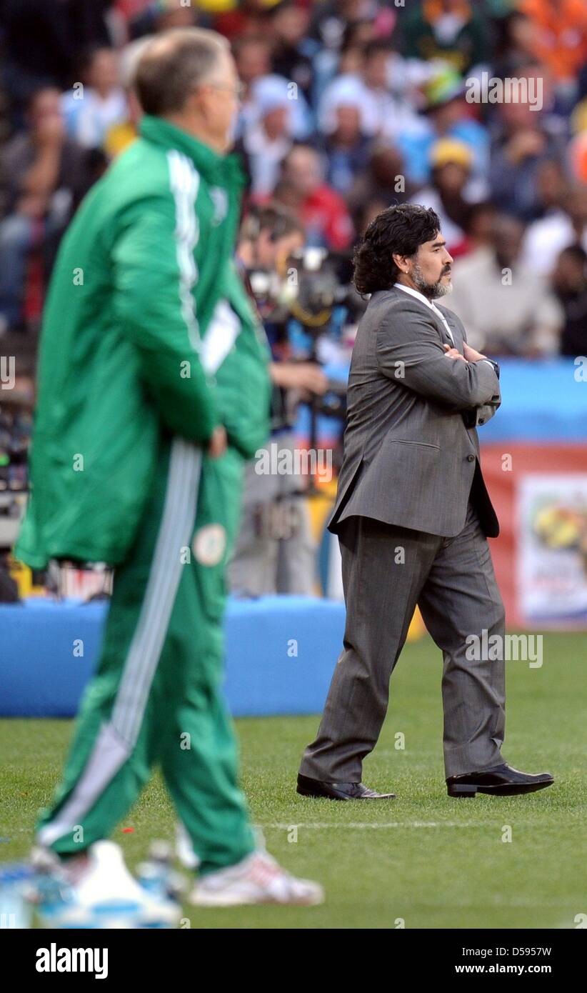 Head Coach Diego Armando Maradona (R) of Argentina and head coach Lars ...