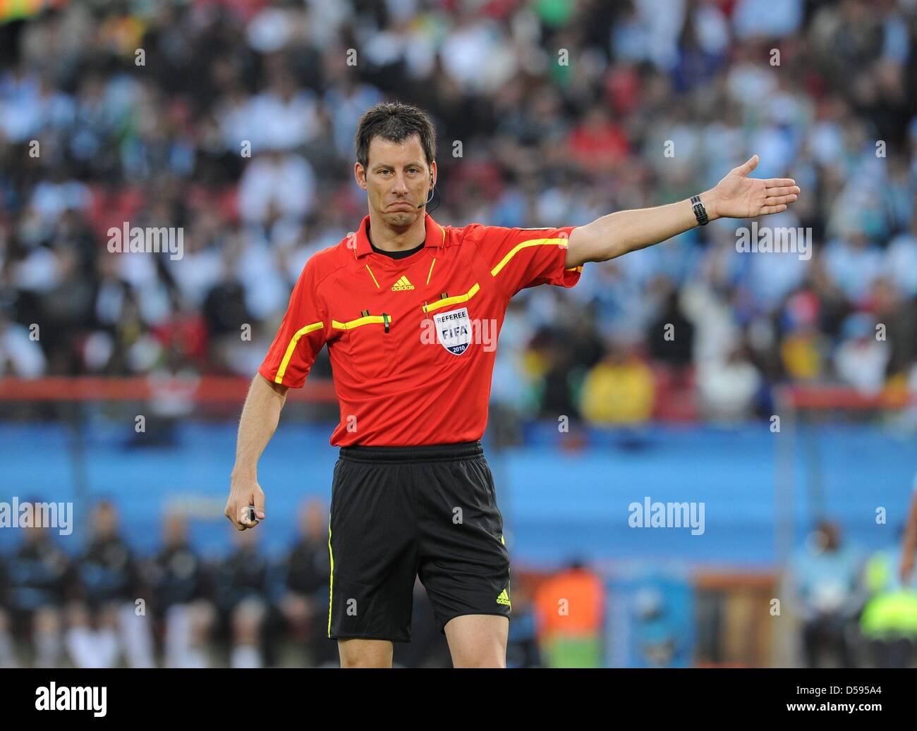 German referee Wolfgang Stark gestures during the 2010 FIFA World Cup ...