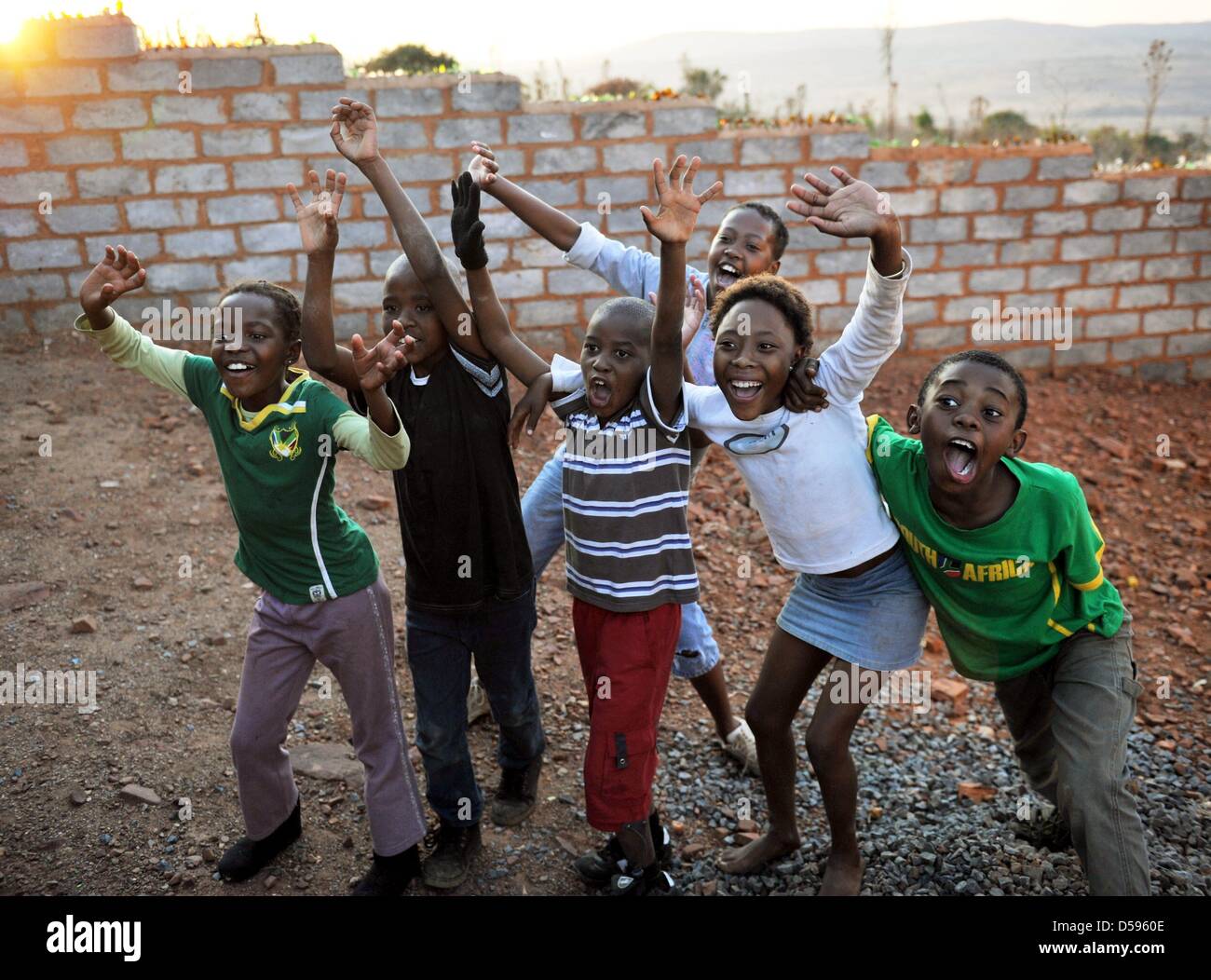 Children pose in a township in Atteridgeville near Pretoria, South ...