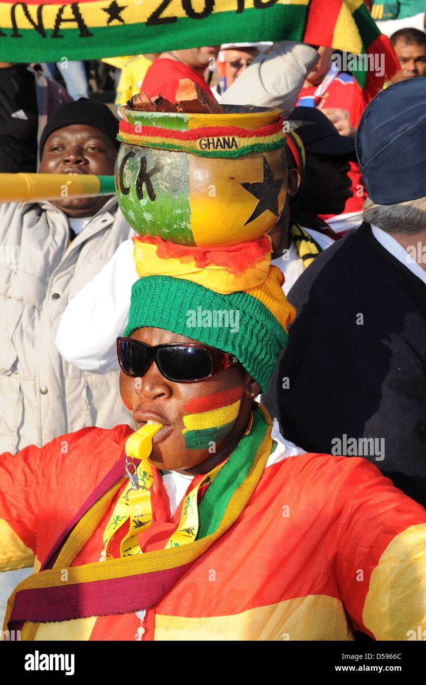 Ghanaian fans celebrate in front of the stadium prior to the 2010 FIFA ...