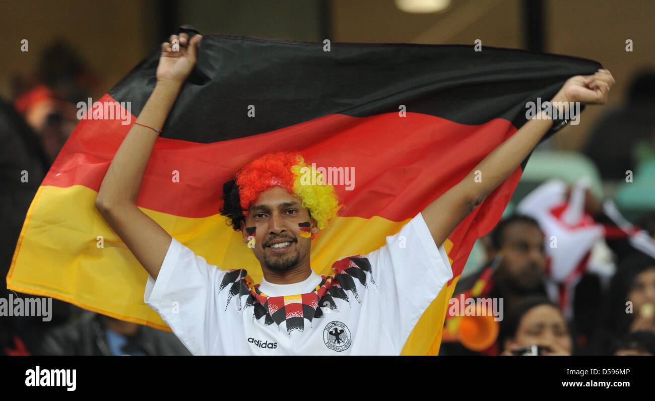 German fans celebrate on the stands prior to the 2010 FIFA World Cup ...