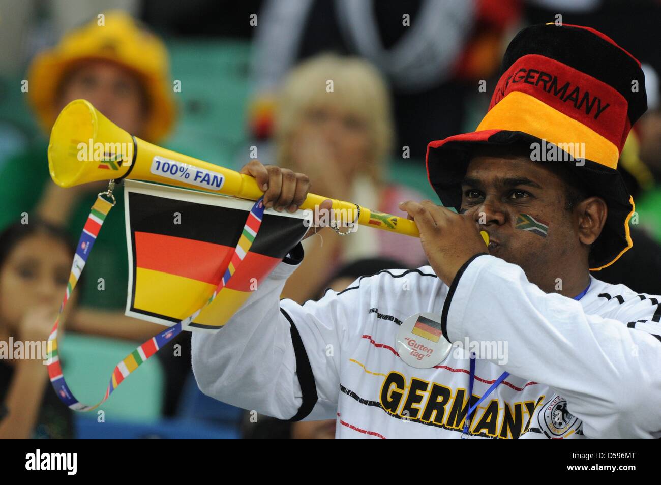 German fans celebrate on the stands prior to the 2010 FIFA World Cup ...