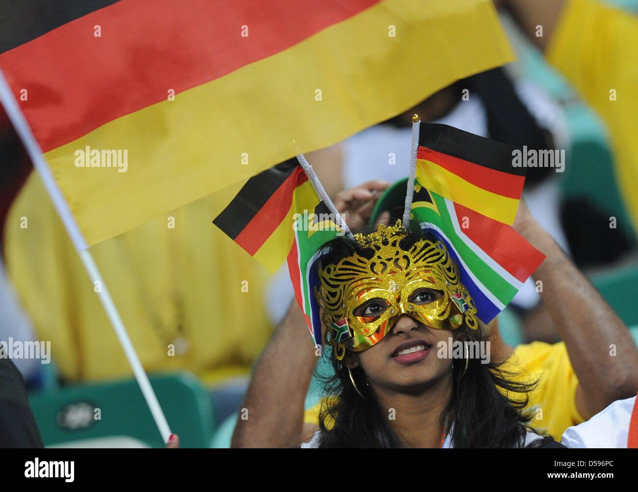 A German fan celebrates on the stands prior to the 2010 FIFA World Cup ...