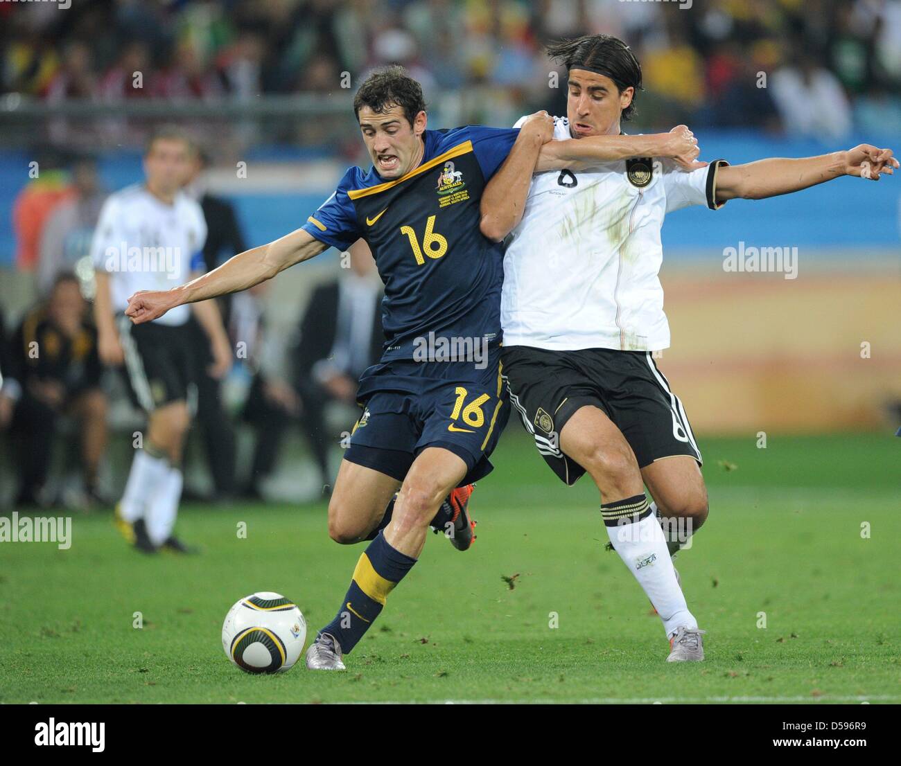 Germany's Sami Khedira (R) and Australia's Carl Valeri vie for the ball ...