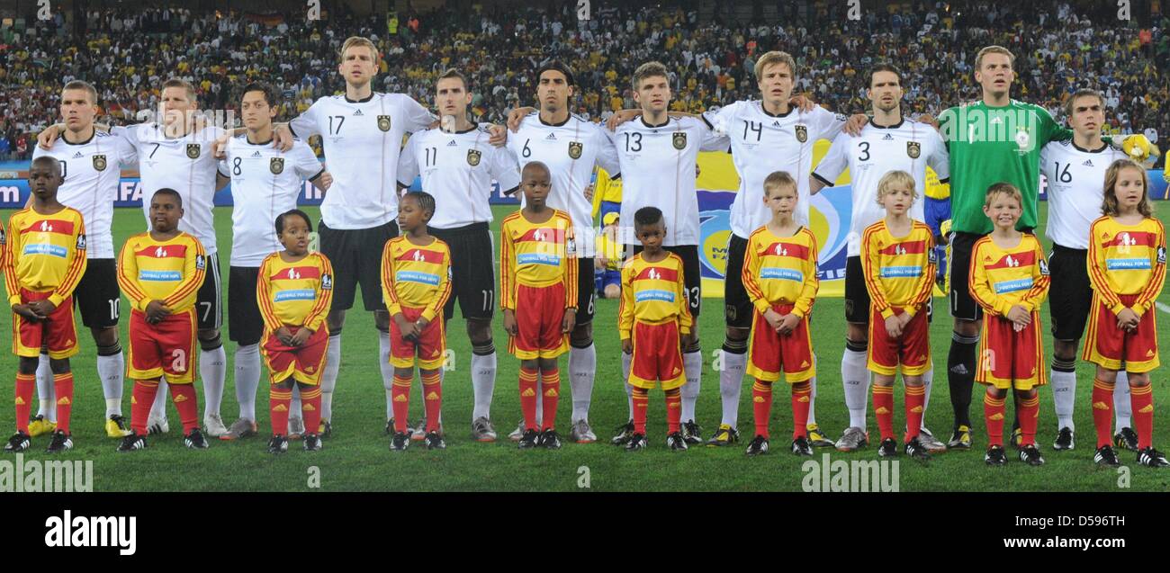 Germany's team stand together for the national anthem prior to the 2010 ...