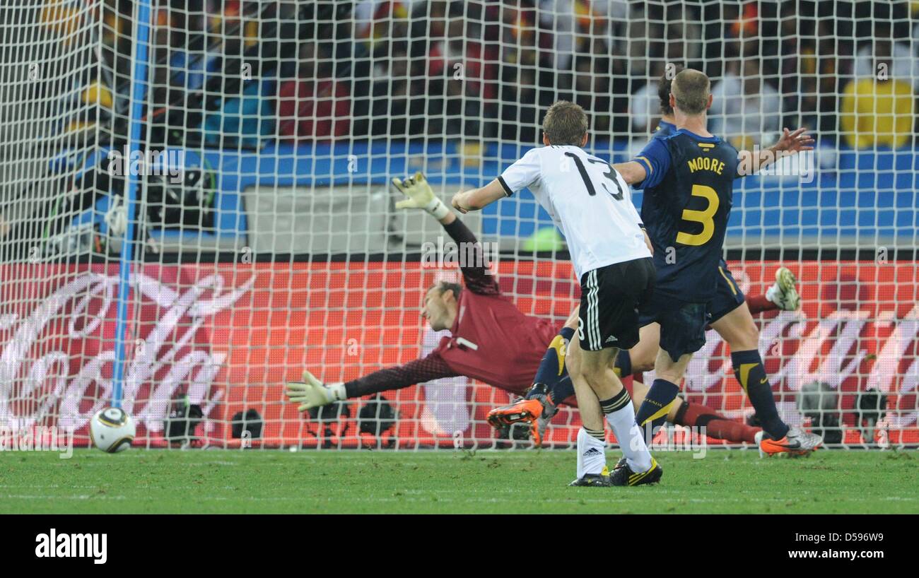 Germany's Thomas Mueller scores the 4-0 against Australia's goalkeeper ...