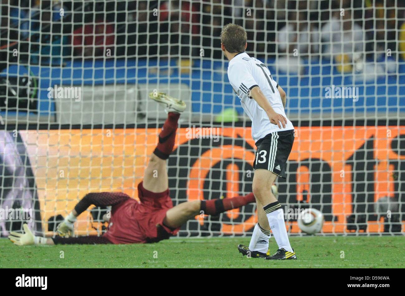Germany's Thomas Mueller scores the 3-0 against Australia's goalkeeper ...