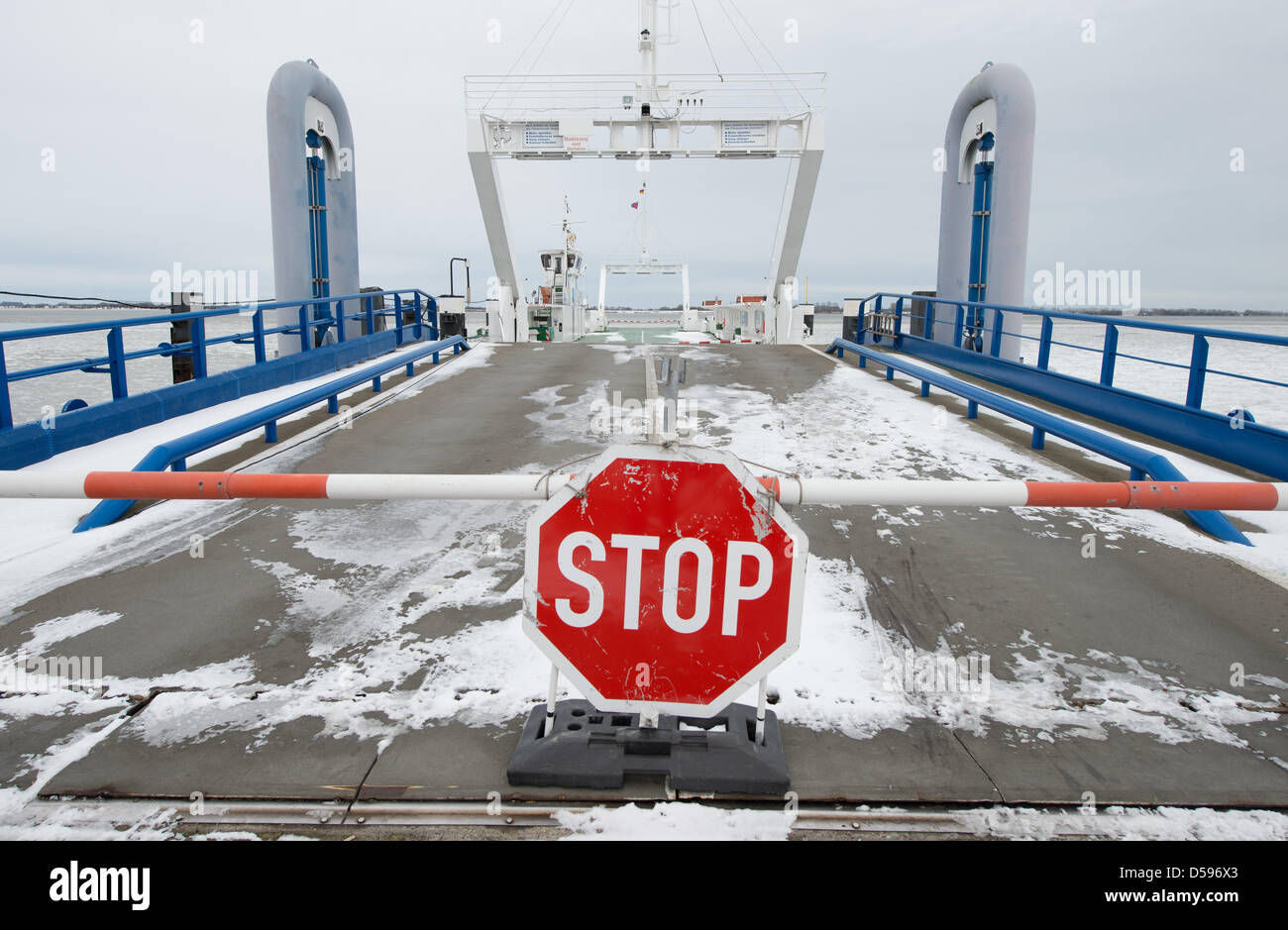A stop sign is visible at the ferry dock of the car ferry of the ...