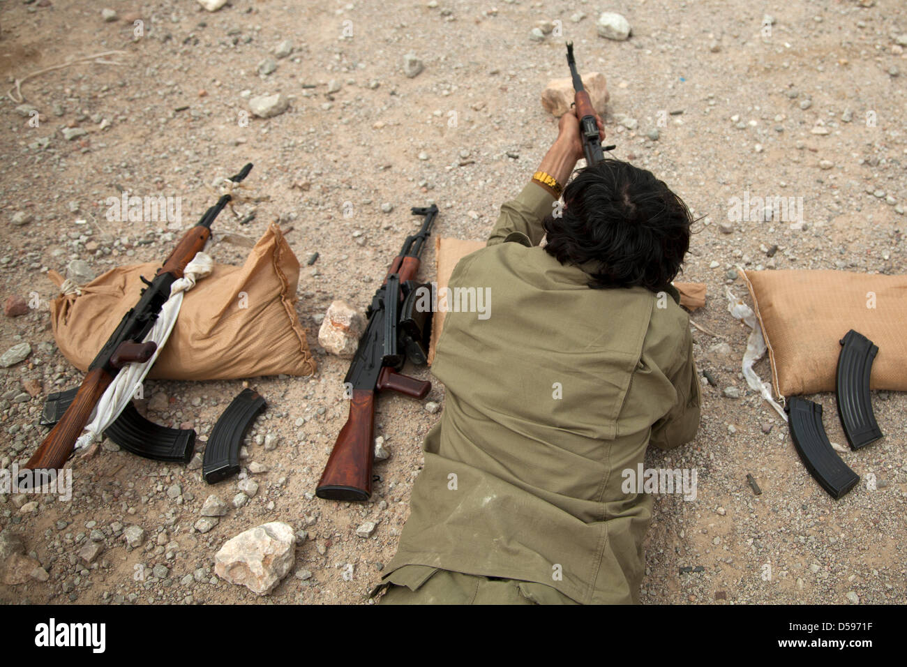 Afghan Local Policeman receives weapons training conducted by Afghan ...