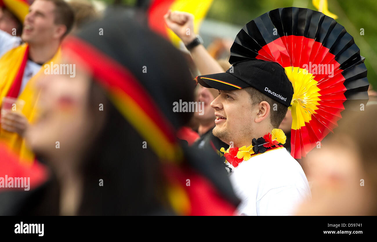 Fans cheer the German team as they attend a public broadcast of the ...