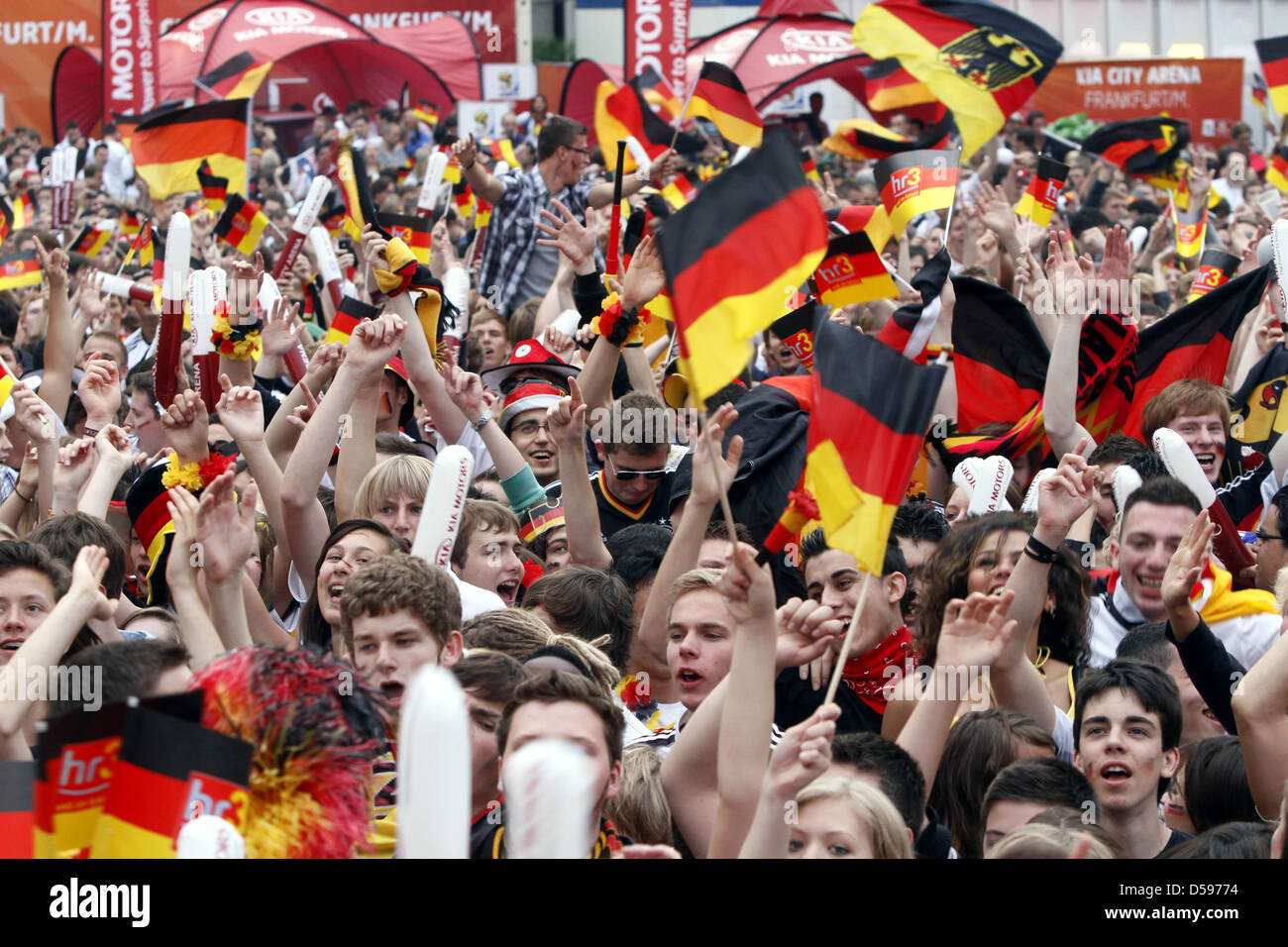 Fans cheer the German team as they attend a public broadcast of the ...