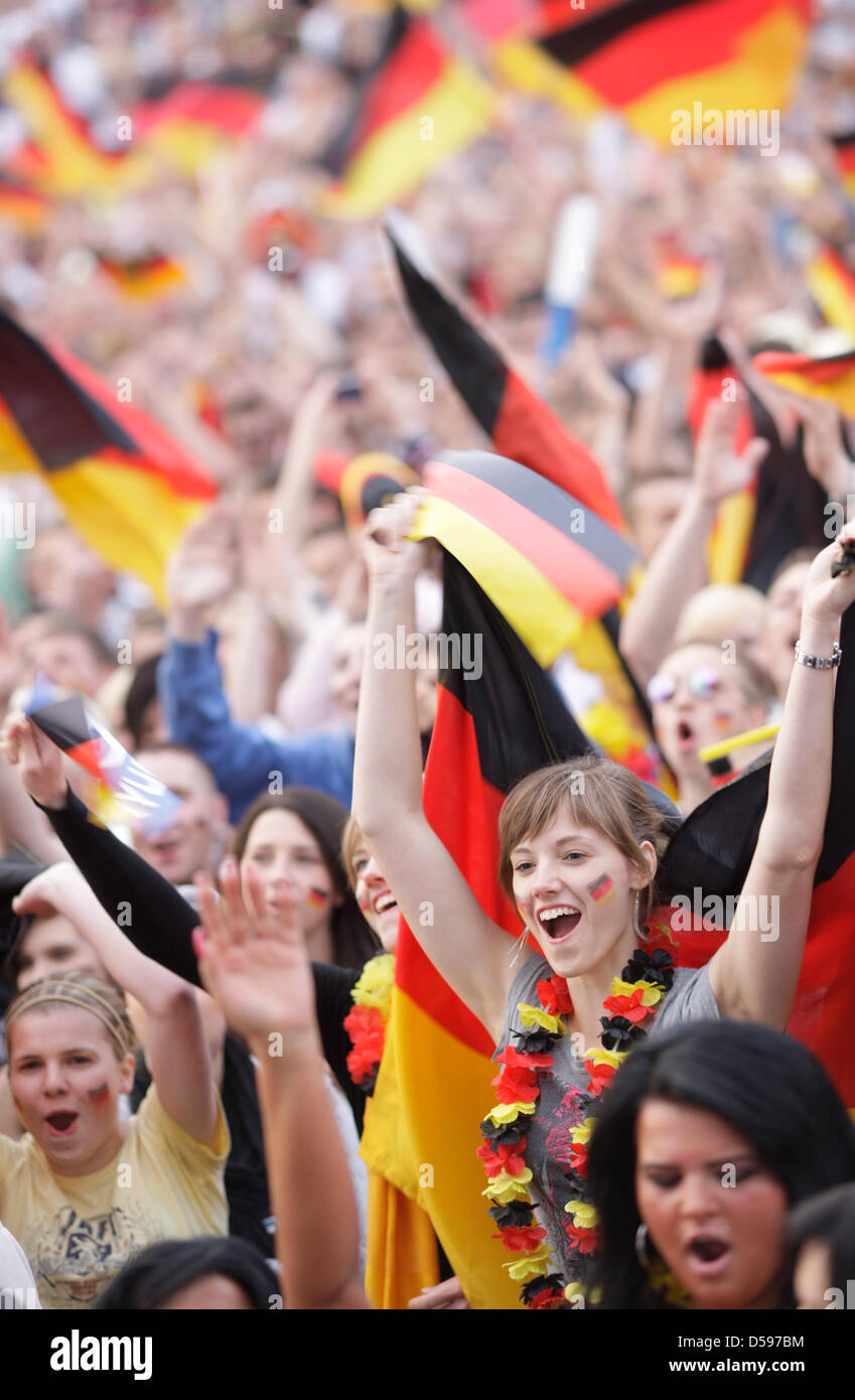 Fans cheer the German team as they attend a public broadcast of the ...