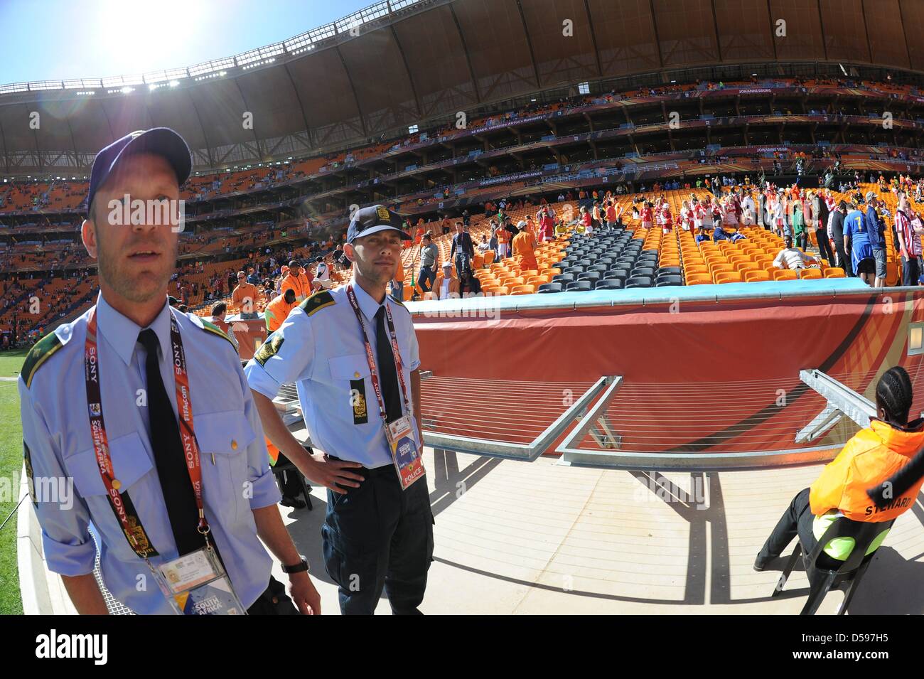 Police officers stand guard prior to the 2010 FIFA World Cup group E ...