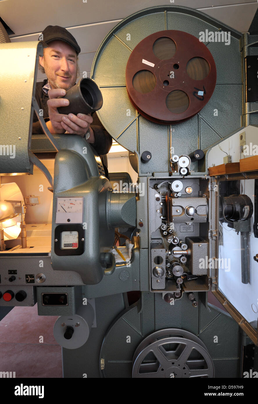 Film projectionist Christian Schmidt poses in the film theatre of ...