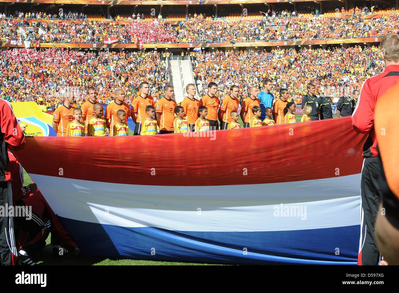 The Dutch team listen to the national anthem during the 2010 FIFA World ...